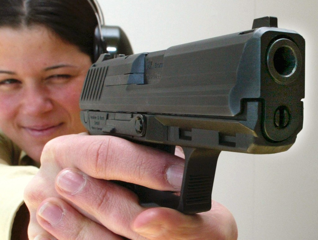 Gun-Wielding Woman Saves Husband From Armed Robbers